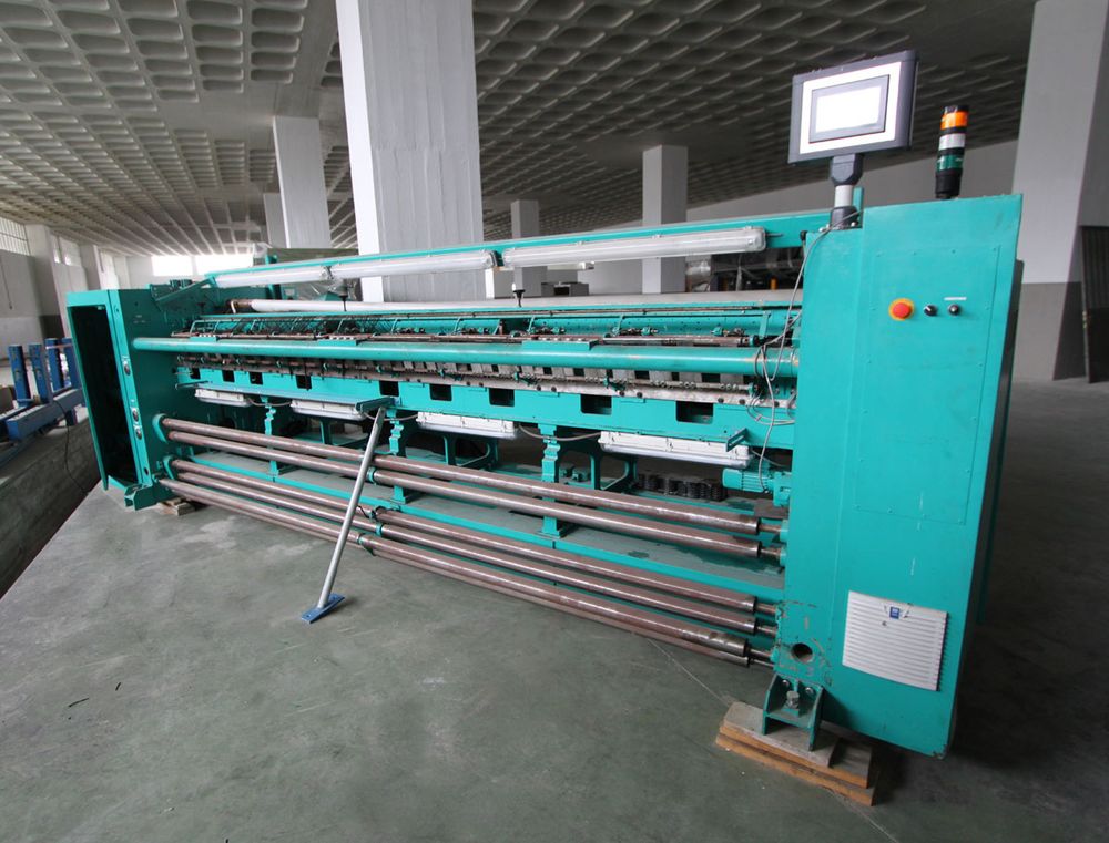 Karl mayer stitch-bonding machine