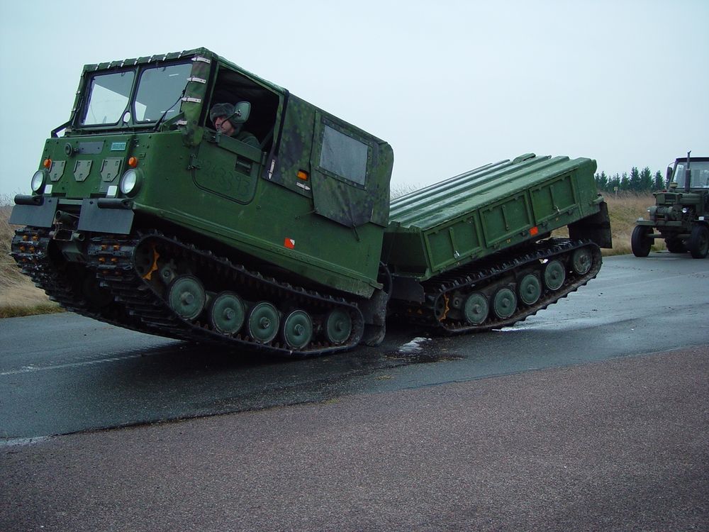 100 Hagglunds Bv206 Soft Top Ammo Carrier with front gun mount