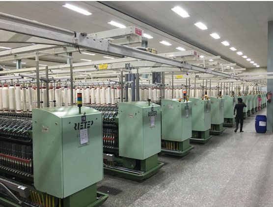21 Rieter K44 Ring spinning frames linked to winders