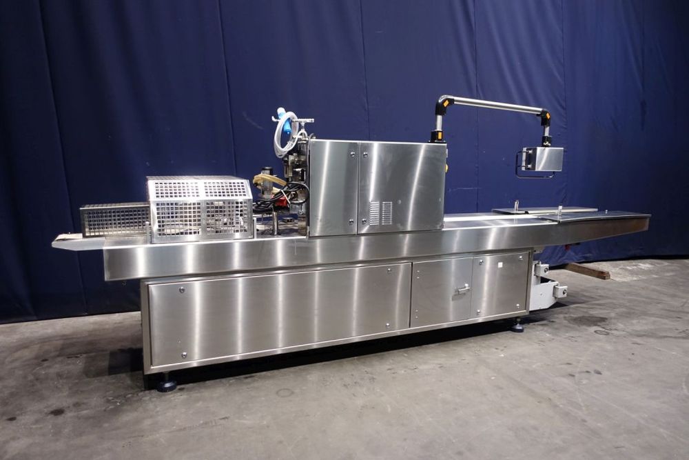 Cryovac CJ55 MD + BDF Horizontal Flow Wrapping machine