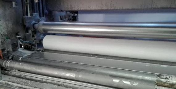 Perini 2.650 mm automatic Start-Stop rewinder 703G with industrial logsaw