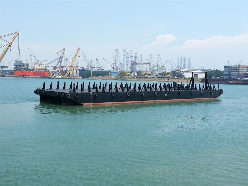 Two “sister” Flattop Barges with loading ramp