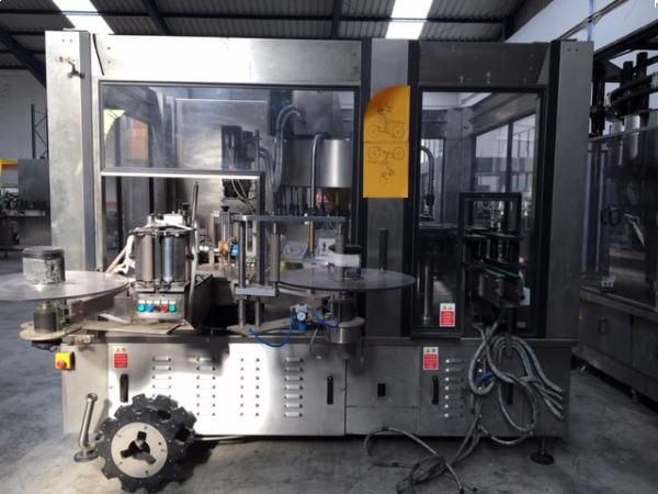 PE ROLLMATIC Self-adhesive rotary labeling machine