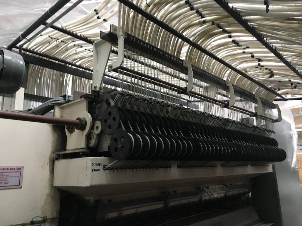 Cobble tufting machine