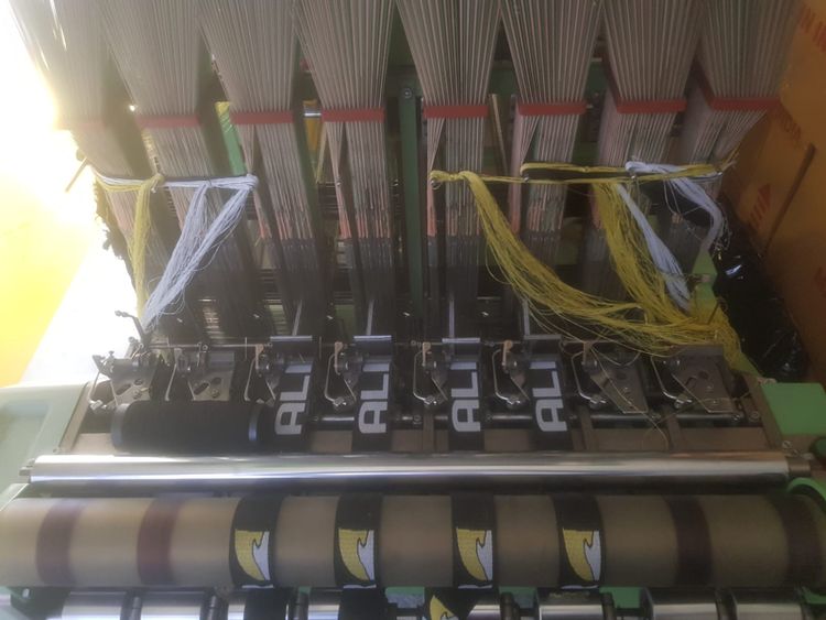 Flat computerized jacquard loom