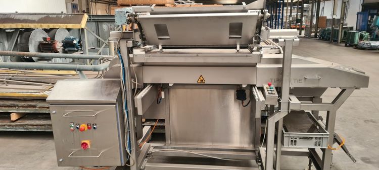 Tipper Tie Automatic Hanging System