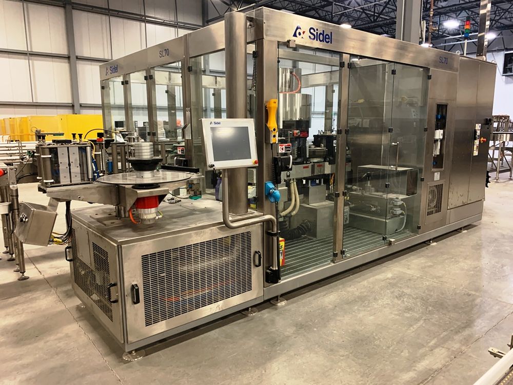 Sidel SL70 20-head PET wrap around rotary bottle labeler