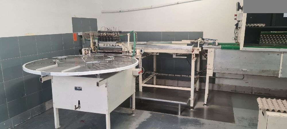 Egg grader + unloading table