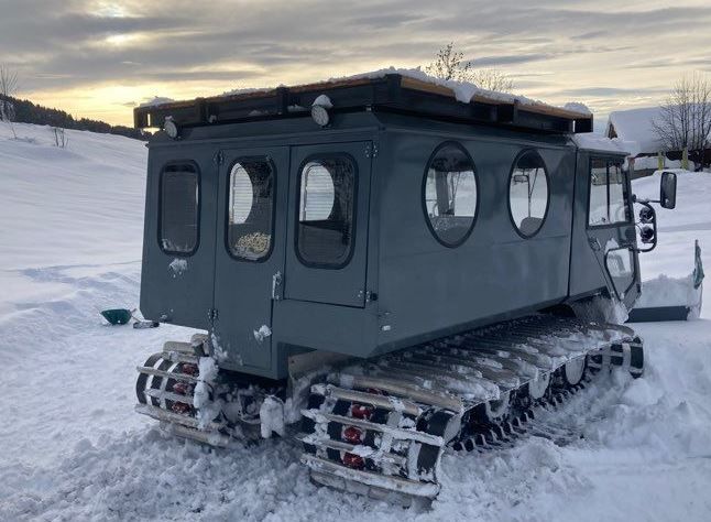 Ratrac groomer with cabin