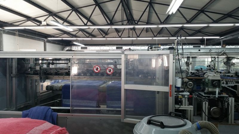 Magetron cross cutting, sewing and hemming machine