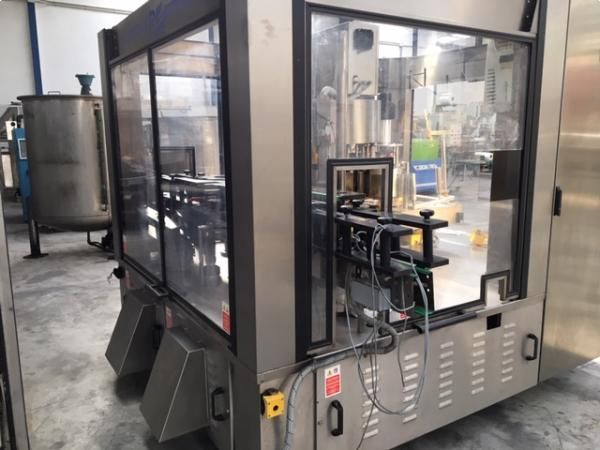 PE ROLLMATIC Self-adhesive rotary labeling machine