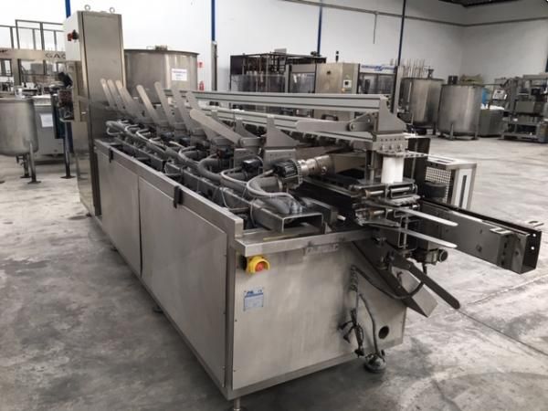 PE ROLLMATIC Self-adhesive rotary labeling machine